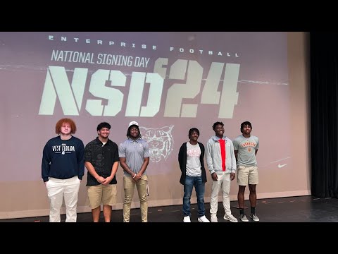 On the dotted line: Four Wildcats football players sign on to next level