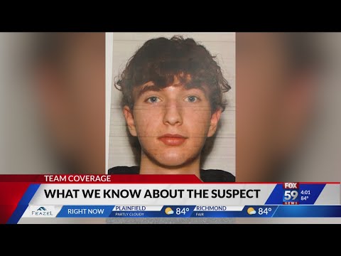 Seymour, Indiana’s Elisjsha Dicken shoots Greenwood, Indiana’s Jonathan ...