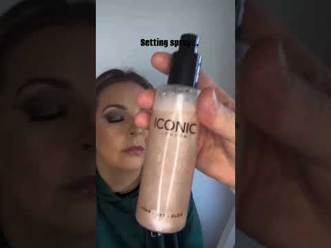 The last step of a makeup application iconic highlighter spray with prep set up glow