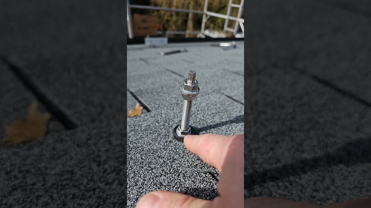 How to fix solar panels Into wooden roof with felt shingles?
