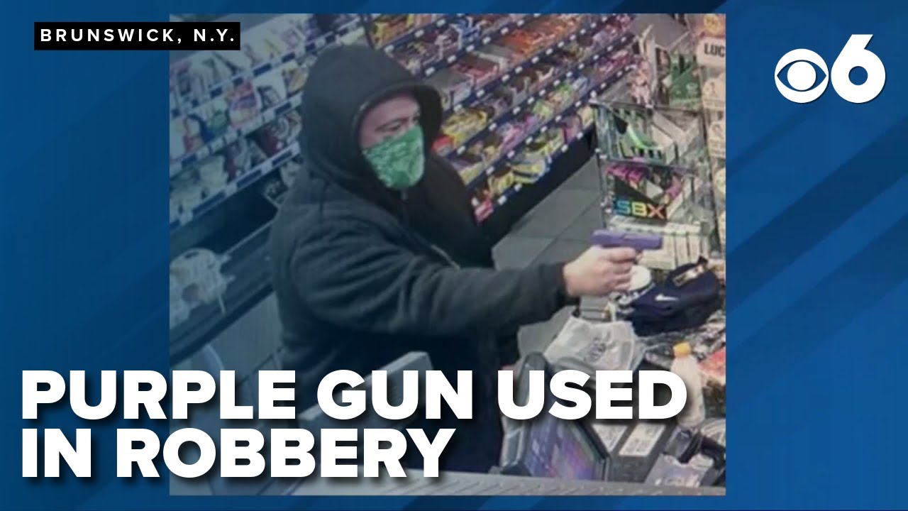 Masked man with purple gun robs gas station