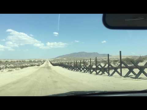 Driving US / Mexico Border Fence Towards Calexico