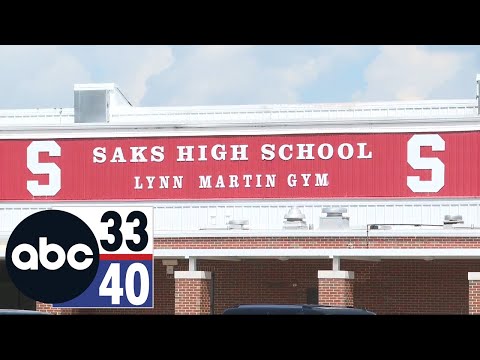 Teacher arrested after being found with gun inside school