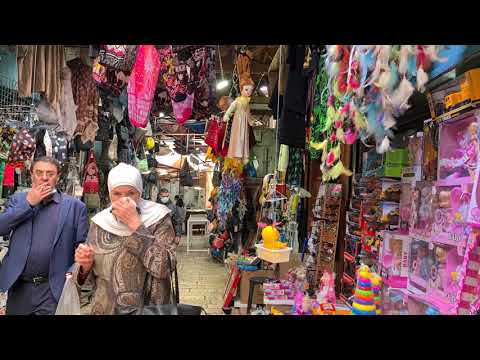 What's the connection between the market of Acre and the Crusader king, Guinea and Venice?