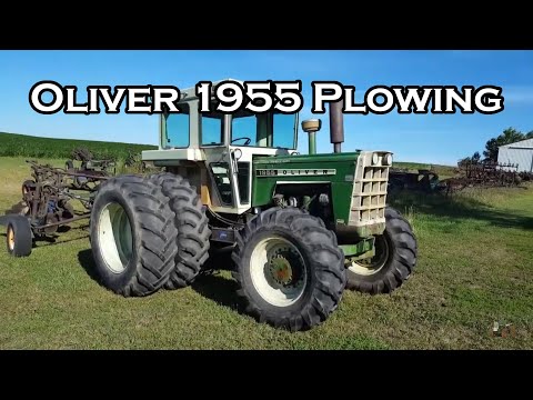 Oliver 1955 FWA tractor plowing with Oliver 448 plow.