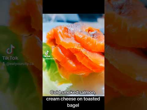 Cold smoked, cured salmon or lox of gravlax on cream cheese bagel #smokedsalmon #lox #bagelsandwich