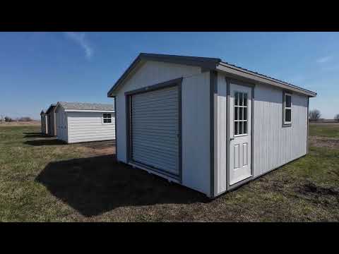 14X20 Portable garage and storage shed with roll up garage door from Sun Rise Sheds