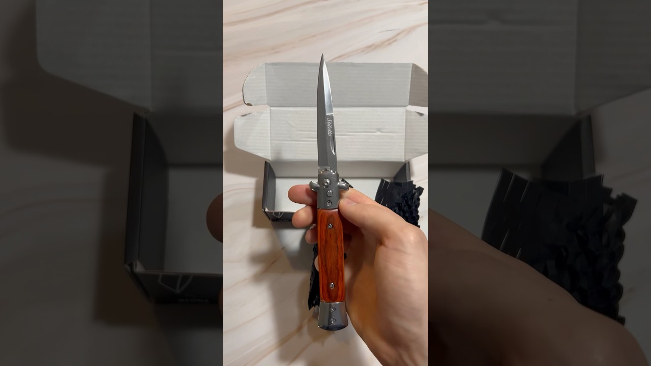 Opening a stiletto knife box that is ILLEGAL