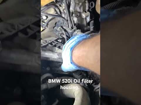 BMW 520i, Engine oil filter housing replaced..