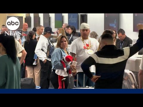 Millions take to skies and roads for Thanksgiving travel rush