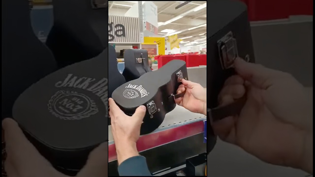 You won't believe what's inside this jack Daniels guitar-shaped case! 😲