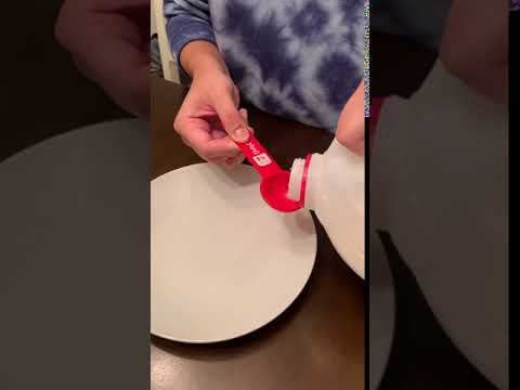Measure 1 tablespoon milk.