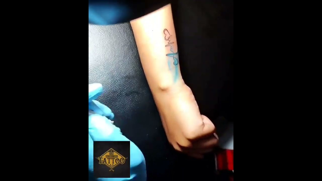 A alfabet tattoo with heartbeat and heart❤