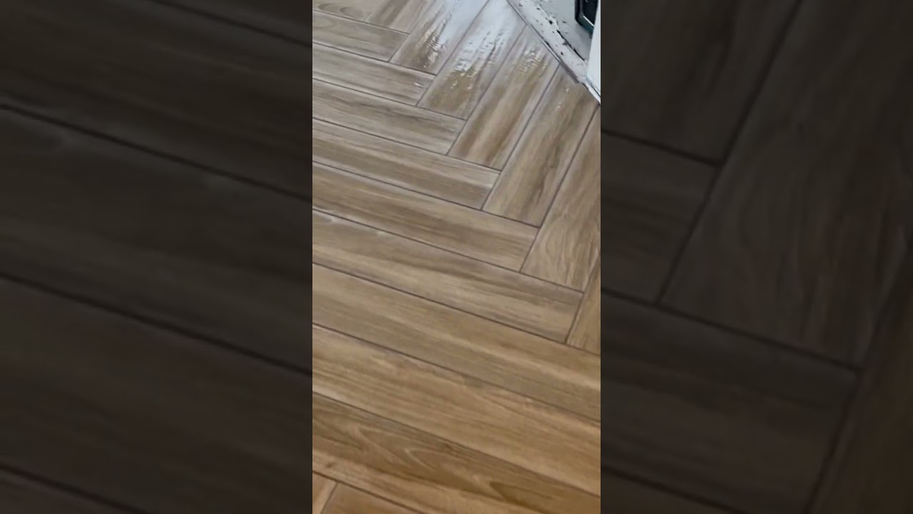 Herringbone floor tiles wood effect floor