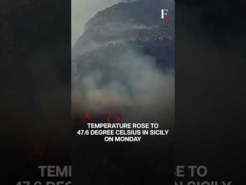 WATCH: Wildfire Comes Dangerously Close to Houses in Italy's Sicily