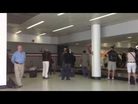 Awful noise at American Airlines Logan Airport Baggage Claim