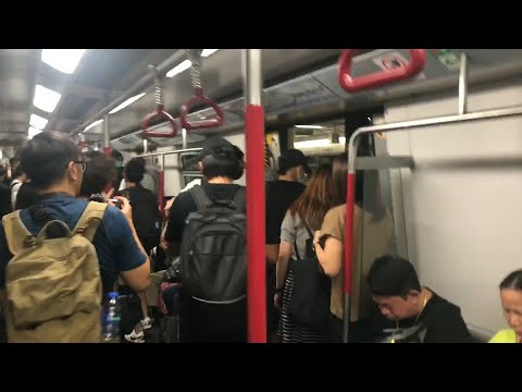 Hong Kong protesters target trains, urge general strike | AFP