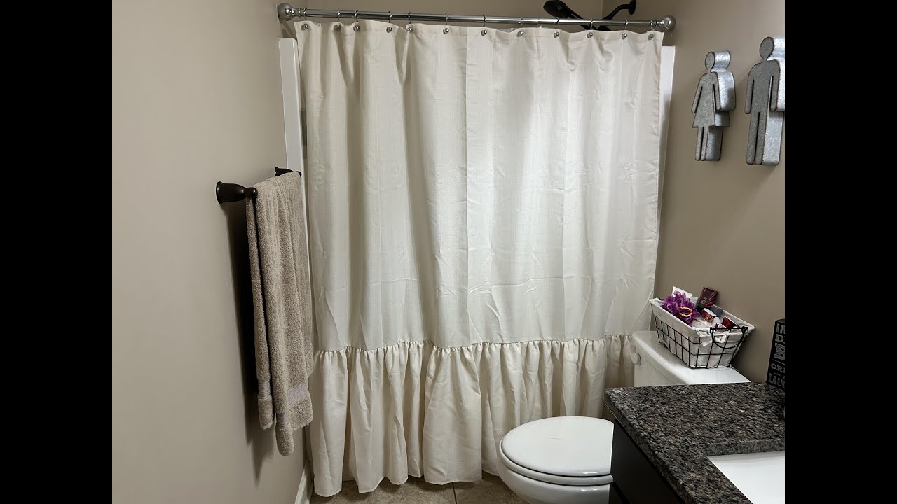Love this ruffled shower curtain