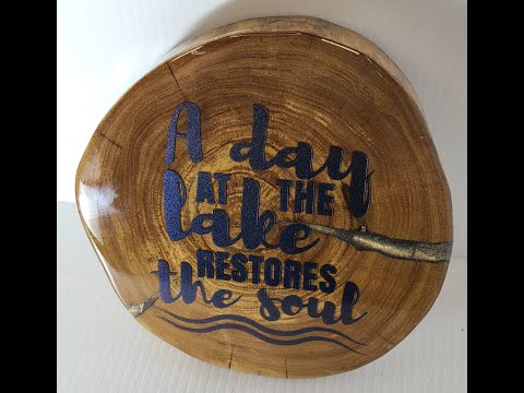 White Walnut Live Edge Slab with Chameleon Pearl used for lettering.