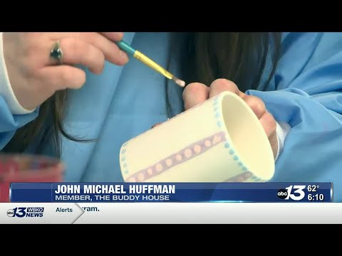 Buddy House Members Paint Mugs to be Sold at The Good Stuff Coffee