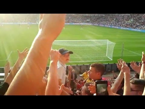 Young PSV Fan Leads Crowd in Cheers