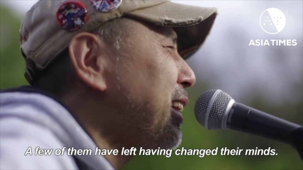 Gatekeeper at Japan's 'Suicide Forest' hopes music can save lives