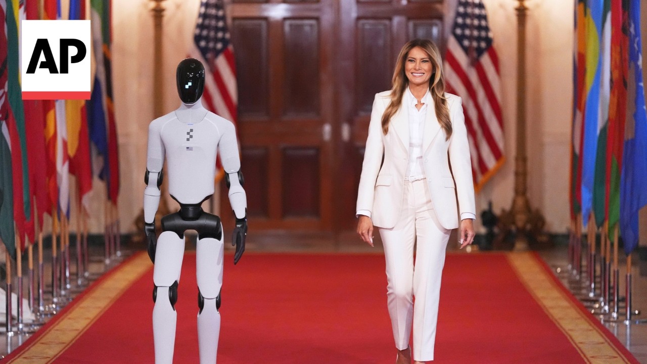 Melania Trump shares spotlight with a robot at education and tech event