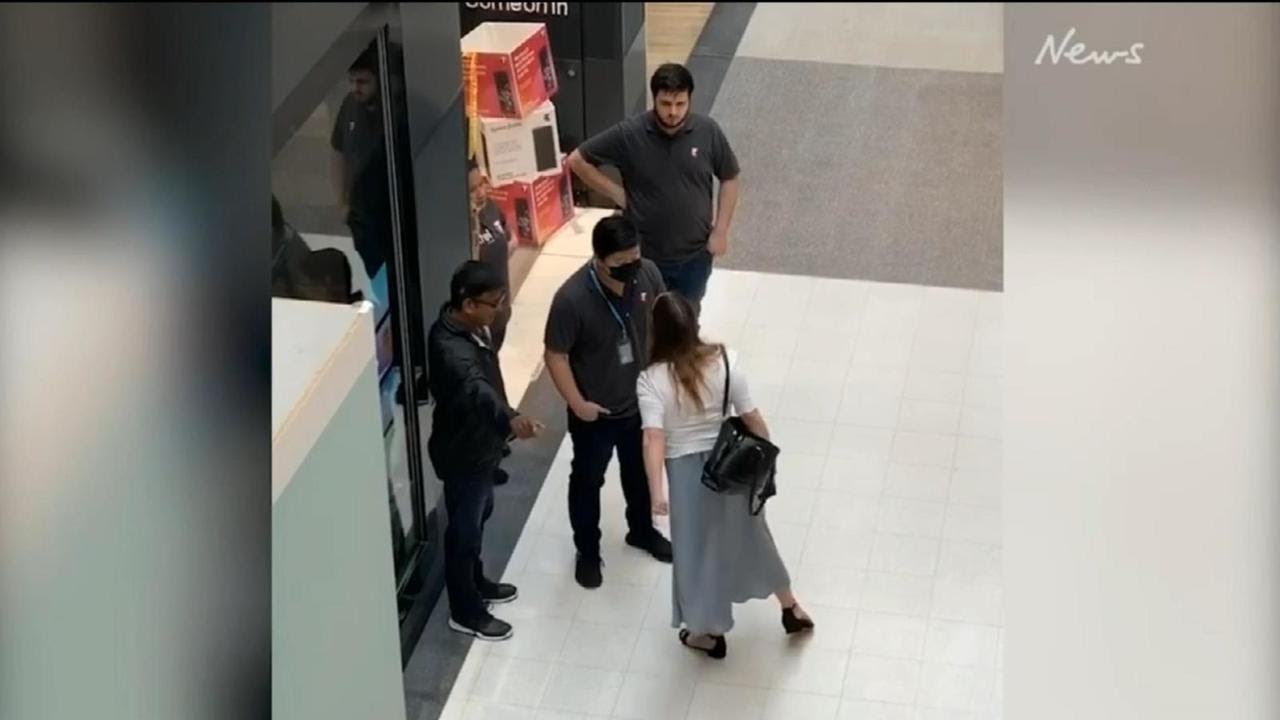 Woman caught on camera abusing Sydney retail worker in 'racially-motivated attack'