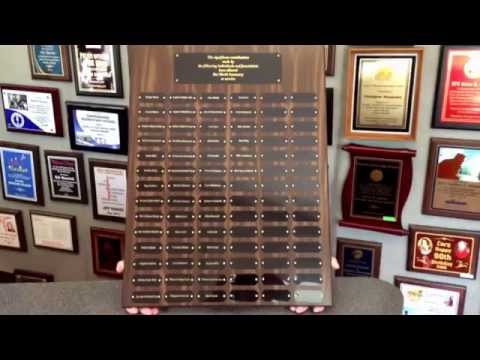 Review of perpetual walnut finish plaque with black plates.
