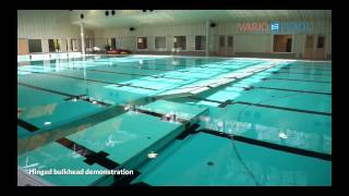 Hinged bulkheads on a fixed location in your swimming pool floor.