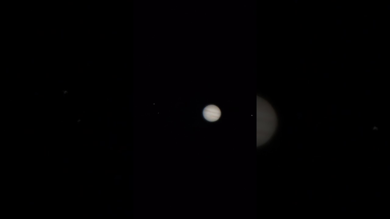 Jupiter with 4 moons and the great red spot