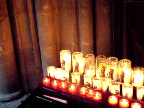 inside Rouen cathedral with organ playing