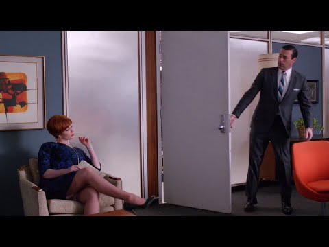 Christina Hendricks oops stockings. Mad Men Joan Harris shows the top of stockings