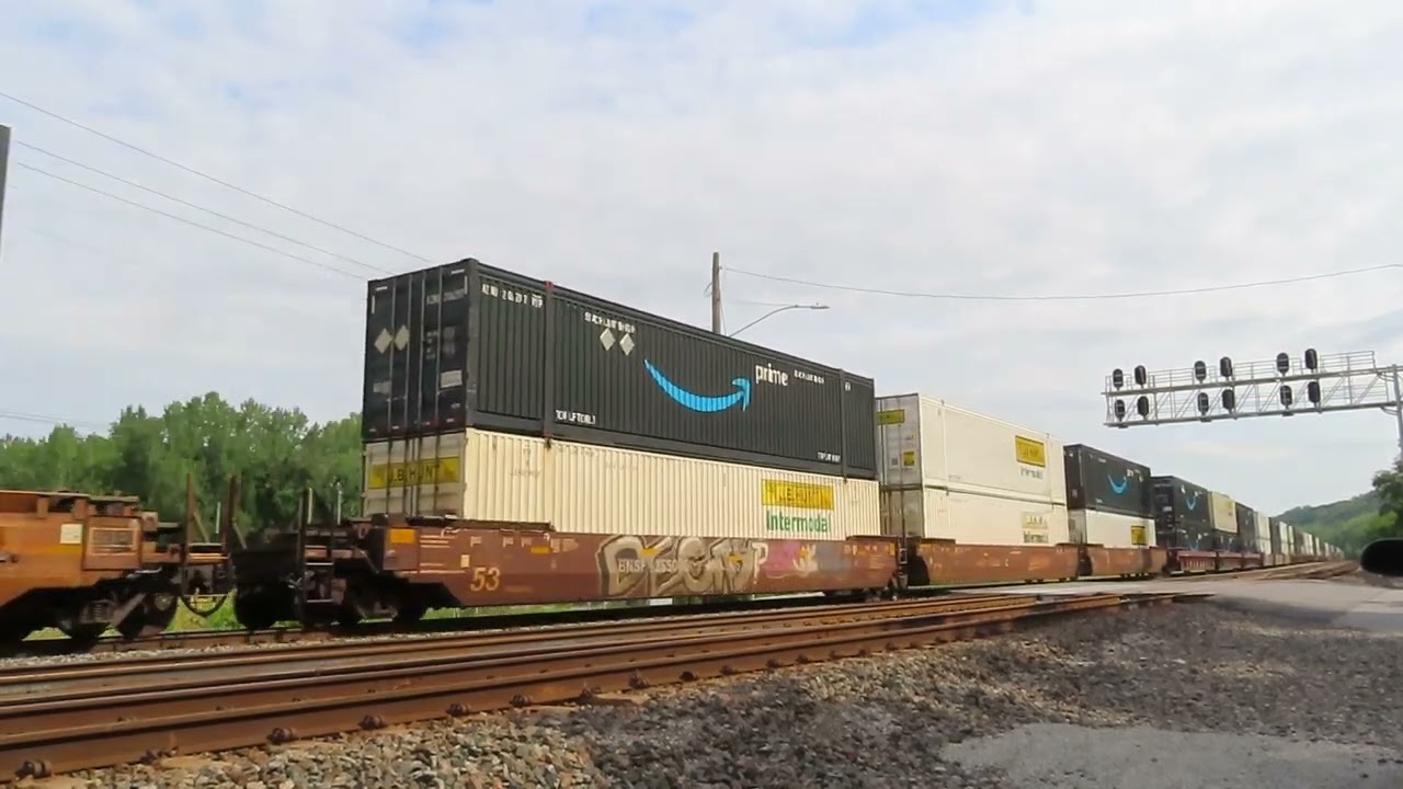 (25th Anniversary Unit) BNSF 7132 leads a westbound stacktrain in Sugar Creek, MO FT 6075!