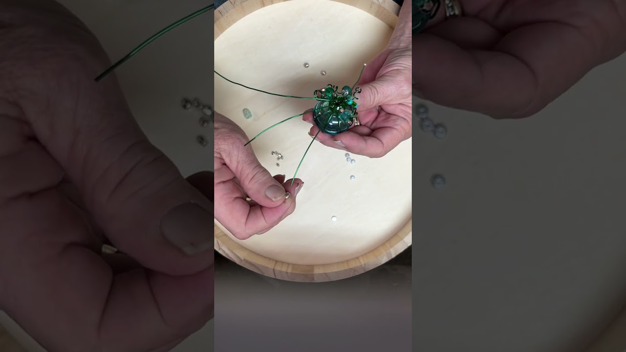Wire and beads create Tablecloth weights