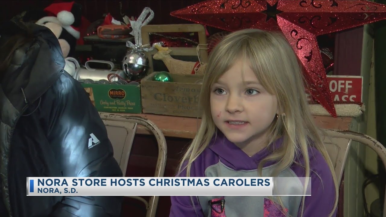 Nora Stores Hosts Christmas Carolers