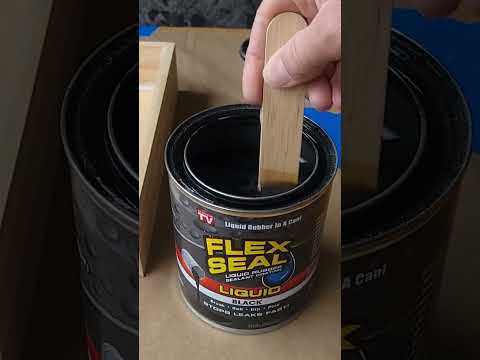 Applying Flex Seal liquid rubber to wood box water fountain reservoir