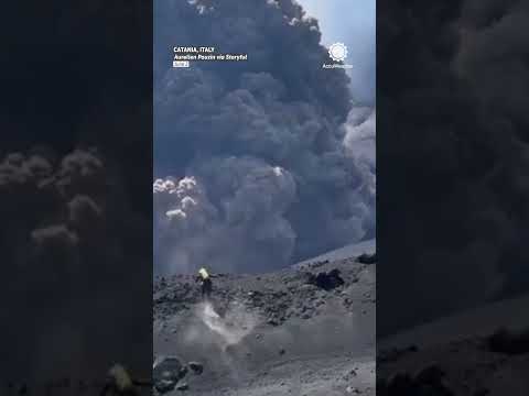 People Run as Mt. Etna Volcano Erupts