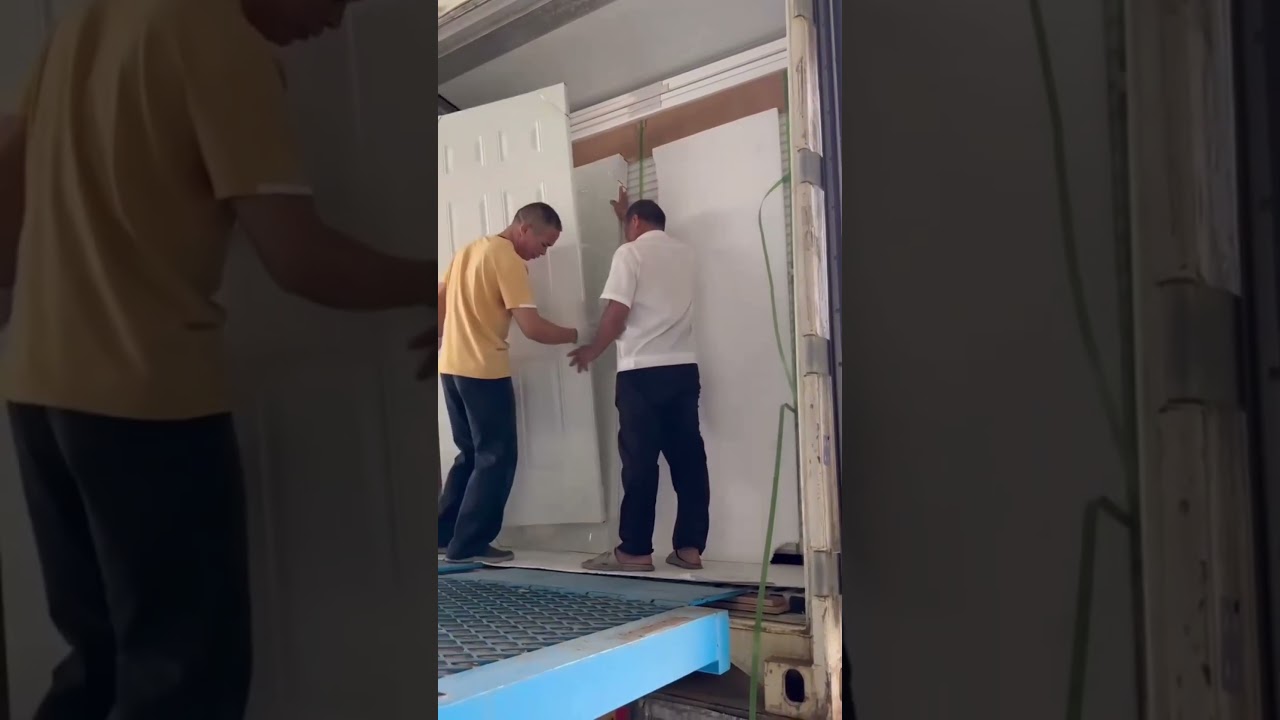 Masterful Loading: Witness the Journey of Our Exquisite White 6 Panel Doors!