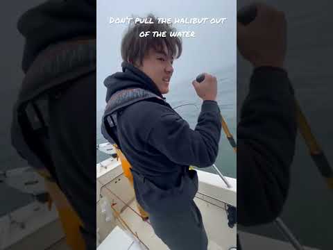 Grandson Learning how to Gaff Grandpa’s Big Halibut