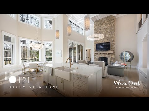 Experience Luxurious Mountain Living in this Stunning Home at Mountaintop Golf & Lake Club!