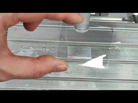 An Engraving in different colors on sapphire glass with an Endurance 10 watt DPSS infrared laser