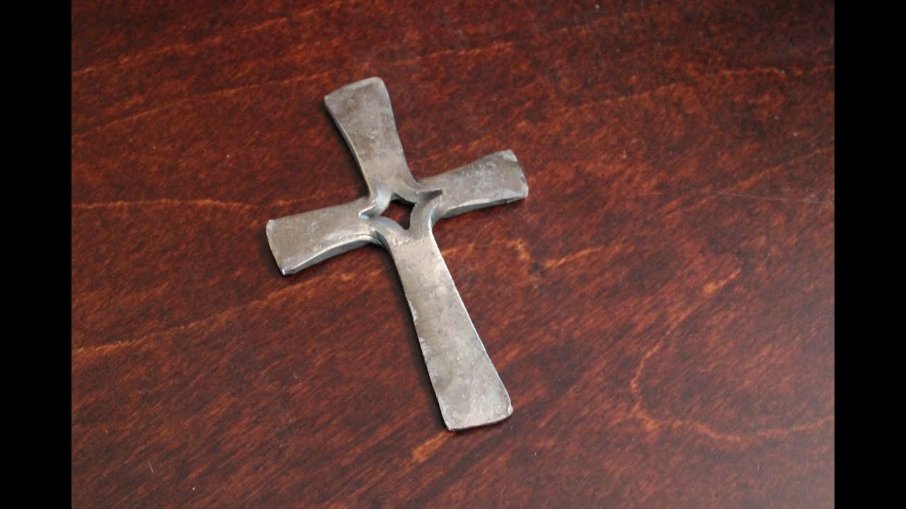 Forging a cross in a screwbench..