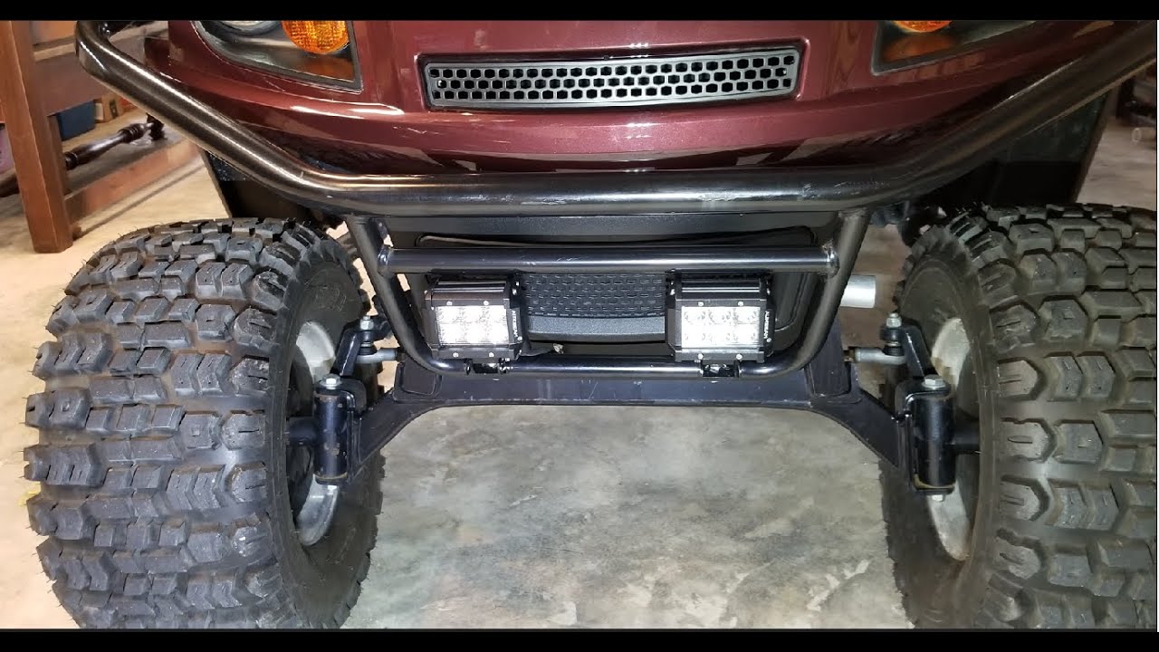 LED light pods installed on a EZGO golf cart.