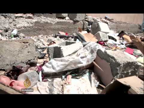 Kurds fight Iraqi government and rebels for territory