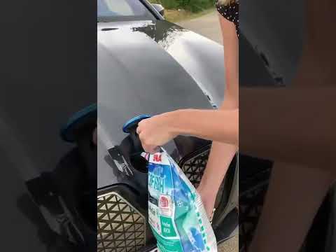 Adding windshield washer fluid in the BMW iX! 🧽 #shorts #bmw