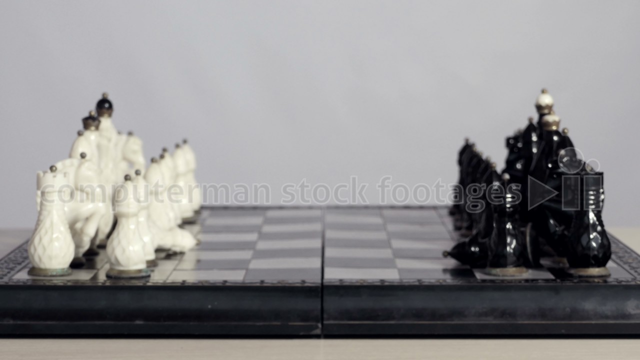 Black and white chess pieces on board