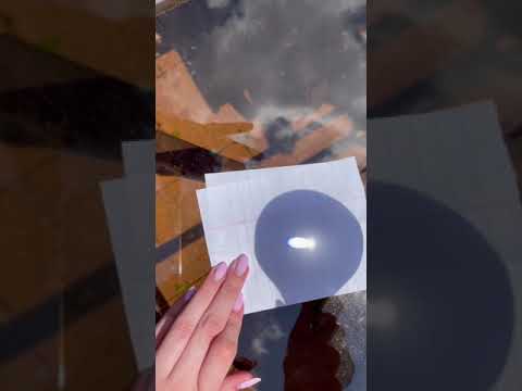 Making fire with a magnifying glass - physics experiment