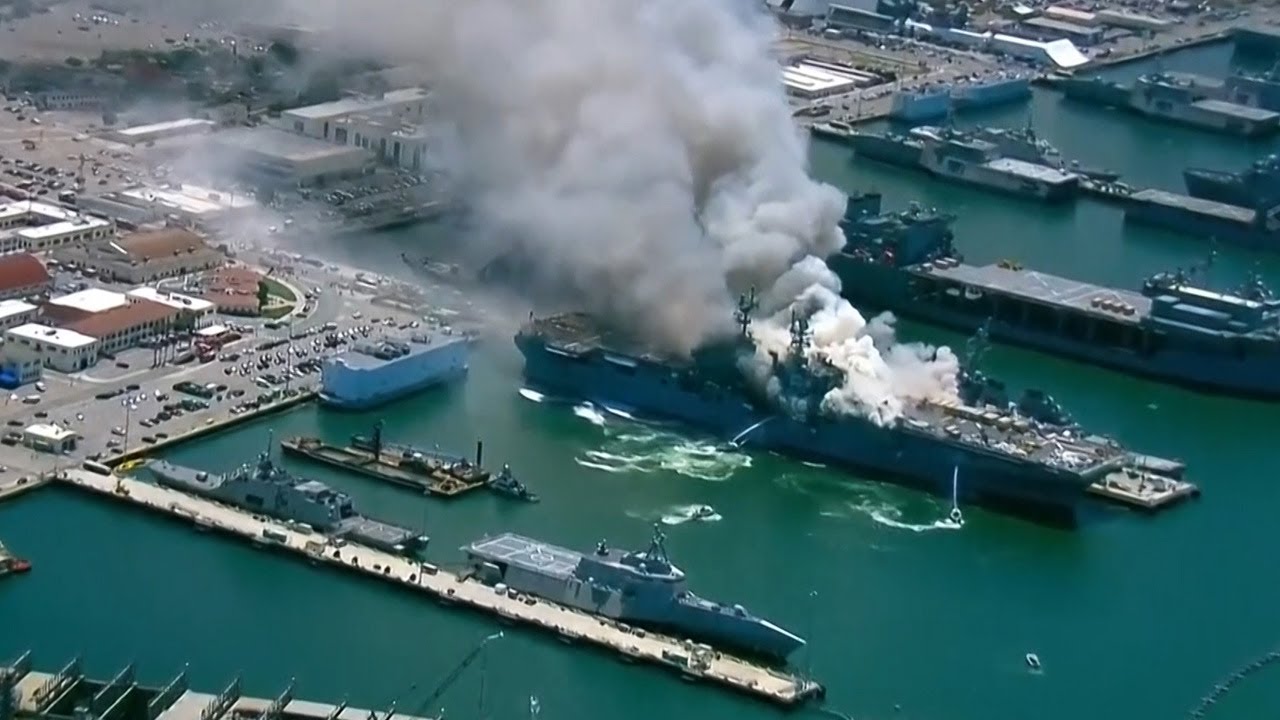 Firefighters battle massive blaze on US navy ship after explosion in ...