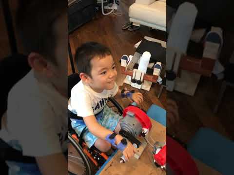 Adapted hand cycle from fisher price smart cycle